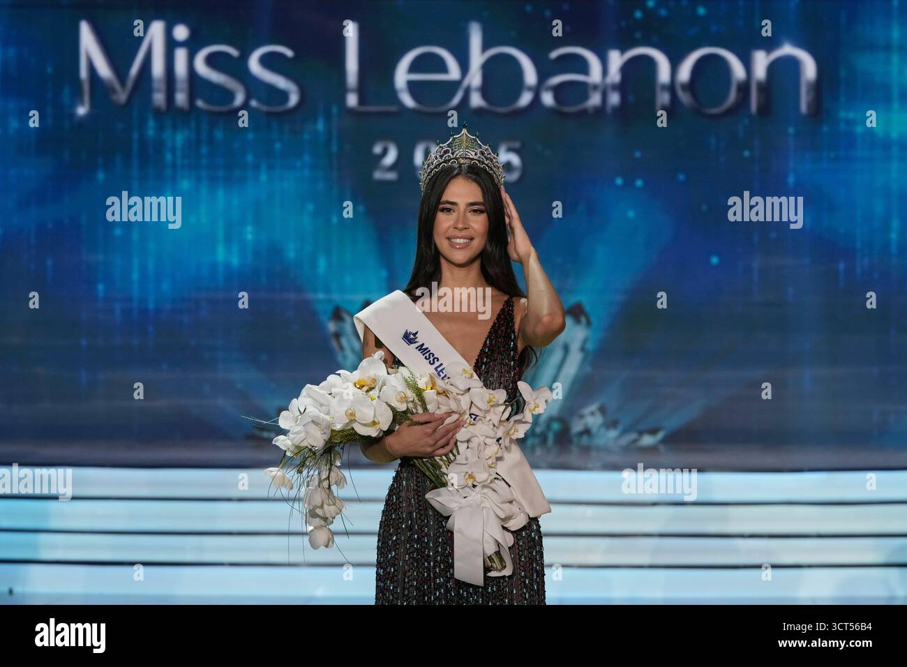 New Miss Lebanon Perla Harb adjusts her crown after winning the Miss ...