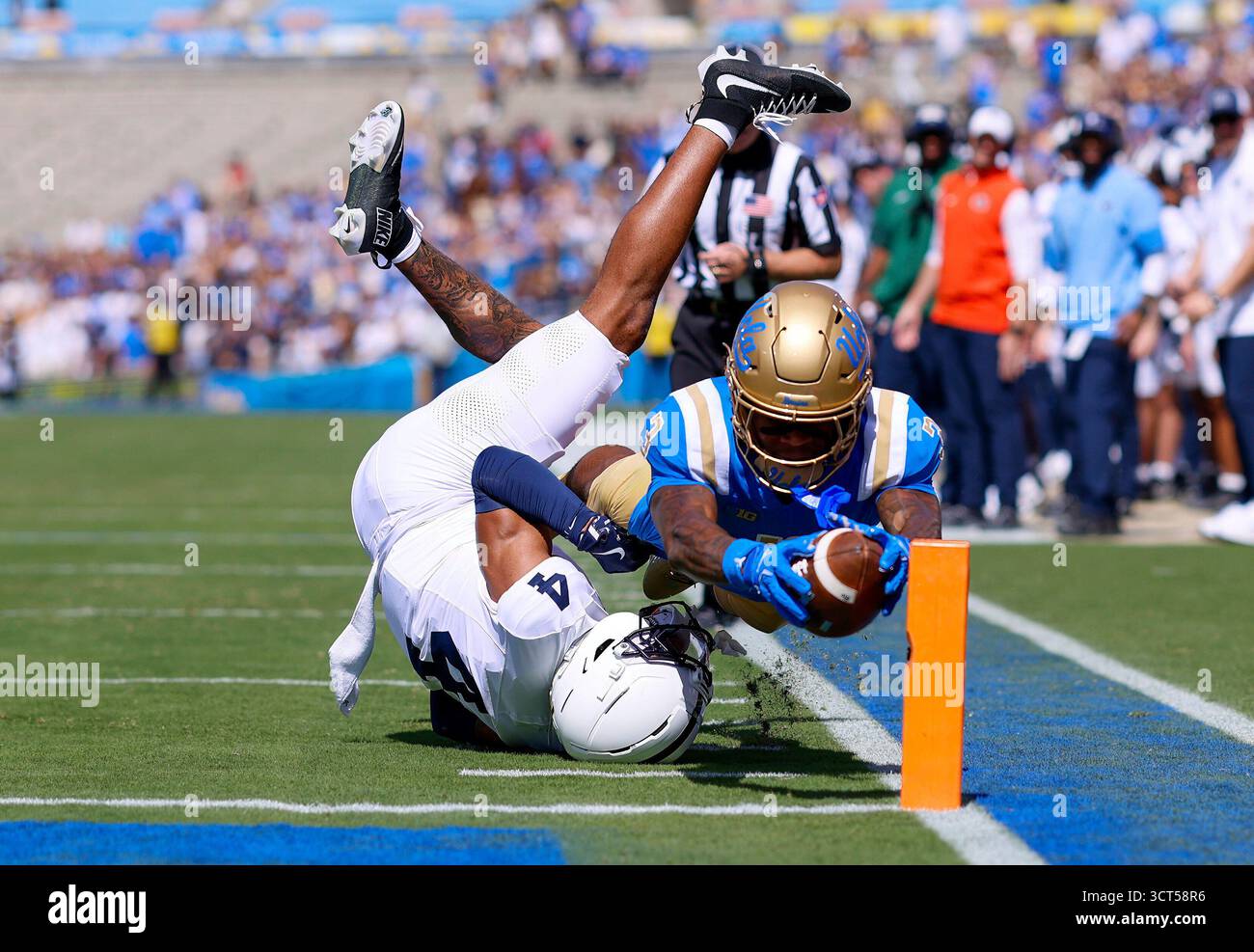 October 04, 2025 UCLA Bruins wide receiver Kwazi Gilmer (3) dives for a ...