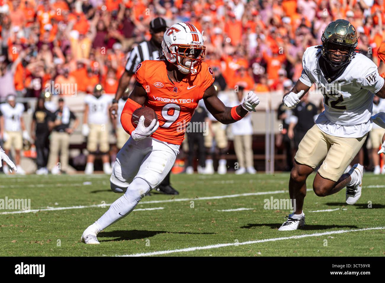 Virginia Tech cornerback Isaiah Brown-Murray (9) runs an interception ...