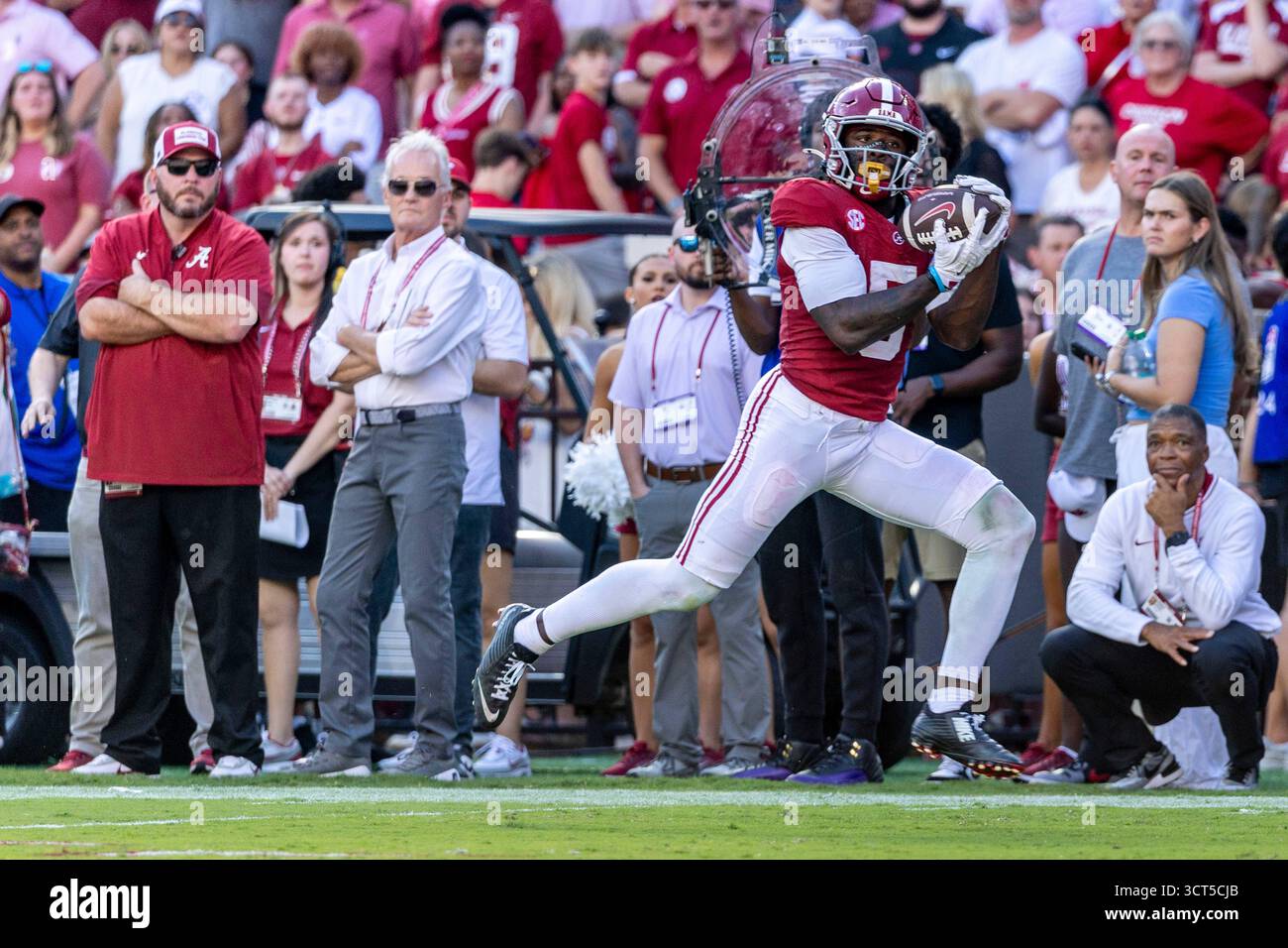 Alabama wide receiver Germie Bernard (5) grabs a pass and runs it into ...