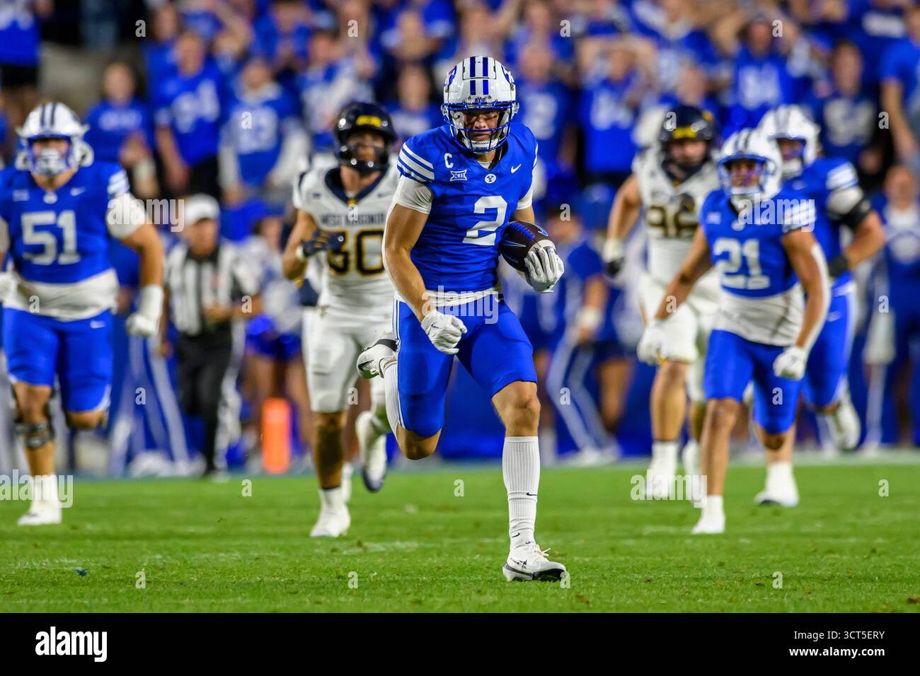 BYU wide receiver Chase Roberts (2) runs the football after a catch ...