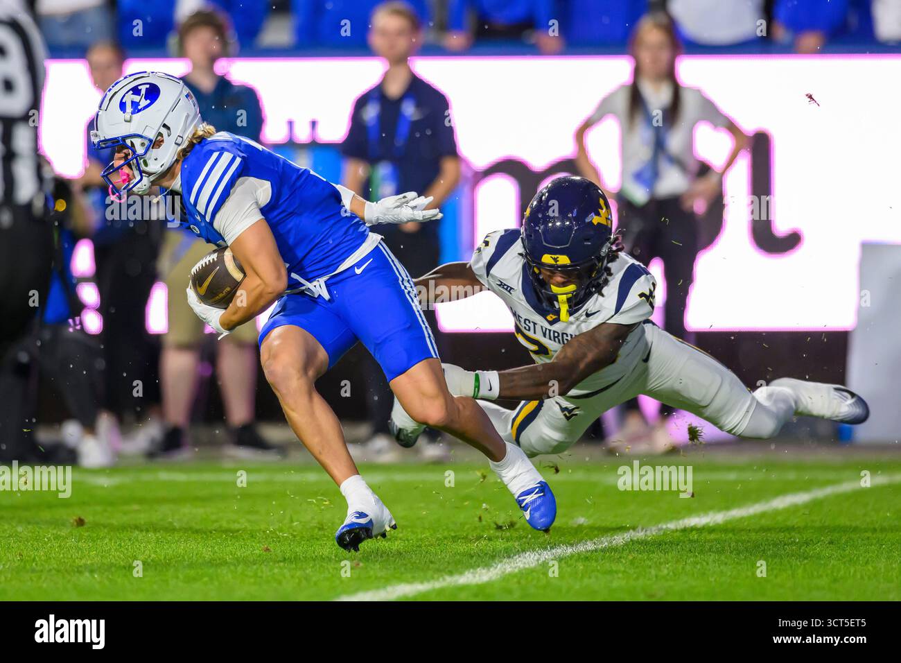 BYU wide receiver Parker Kingston (11) evades the tackle of West ...