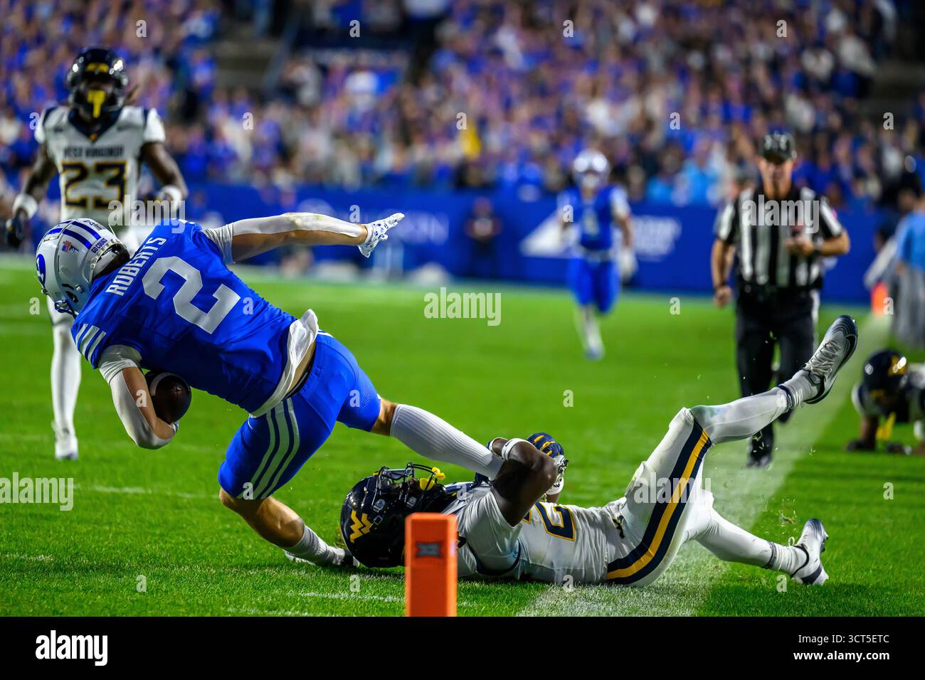 BYU wide receiver Chase Roberts (2) is tackled at the goal line by West ...
