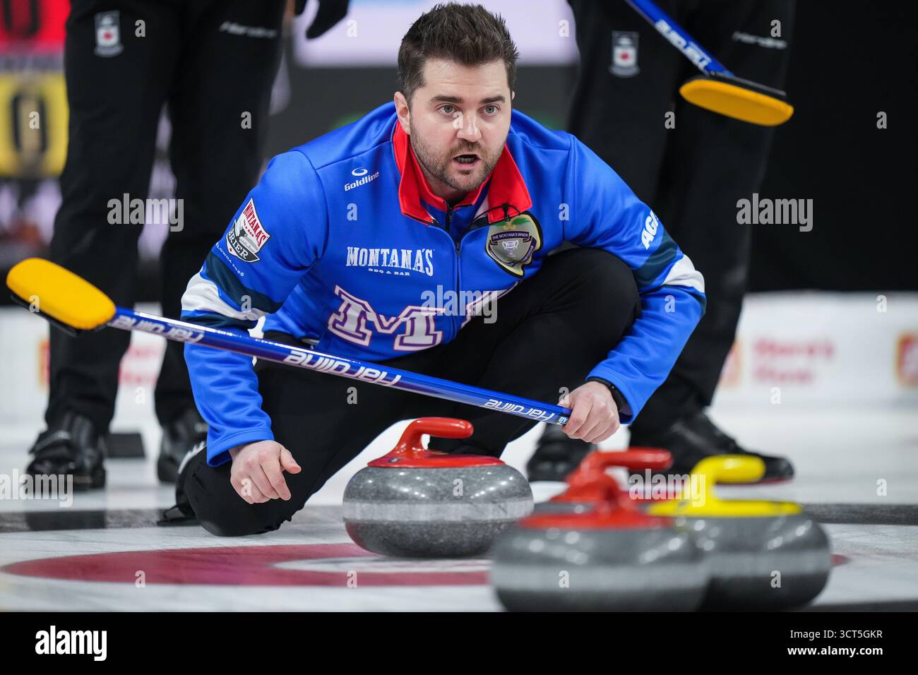 Manitoba-Dunstone skip Matt Dunstone calls out to the sweepers while ...