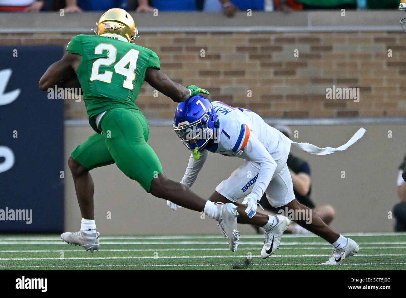 Notre Dame running back Jadarian Price (24) rushes for a 52 yard touchdown against Boise State's ...