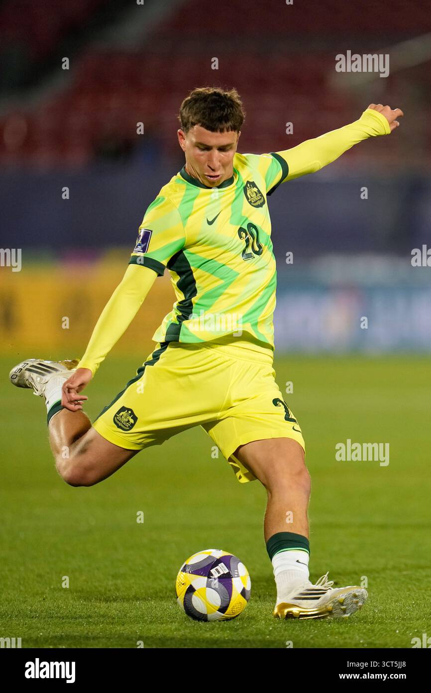 Australia's Louis Agosti attempts a shot on goal against Cuba during a ...