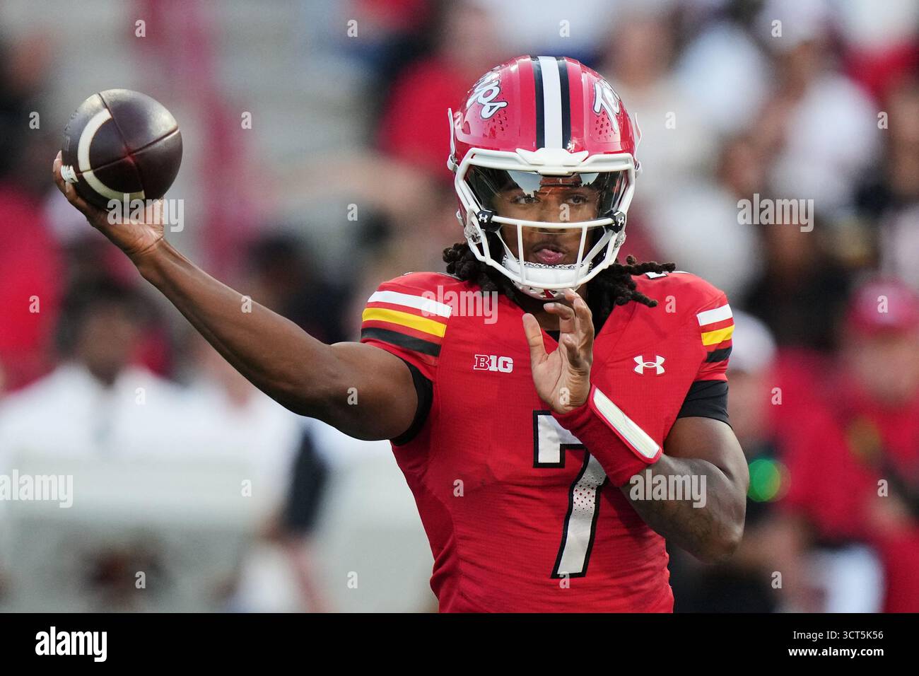 Maryland quarterback Malik Washington looks to throw against Washington ...