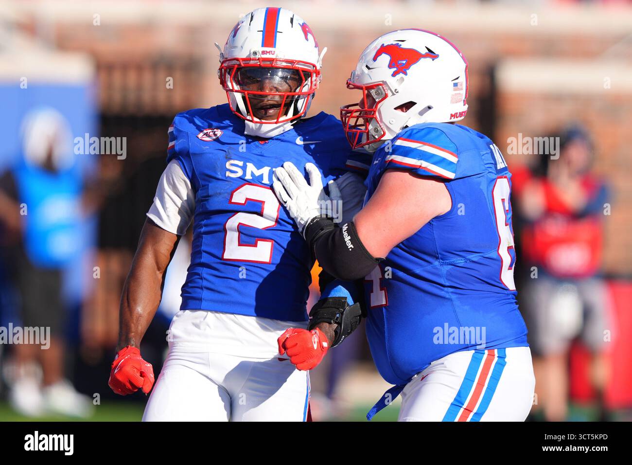 SMU wide receiver Jordan Hudson (2) is congratulated by teammate ...
