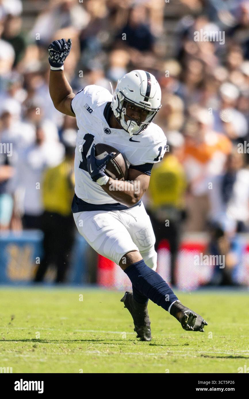 Penn State running back Nicholas Singleton (10) runs with the ball ...