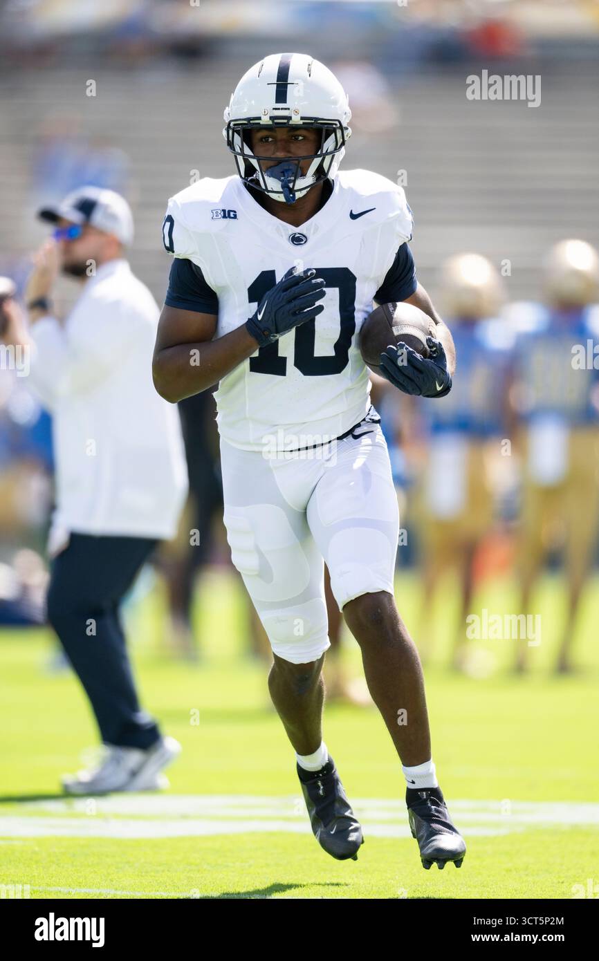 Penn State running back Nicholas Singleton (10) runs with the ball ...