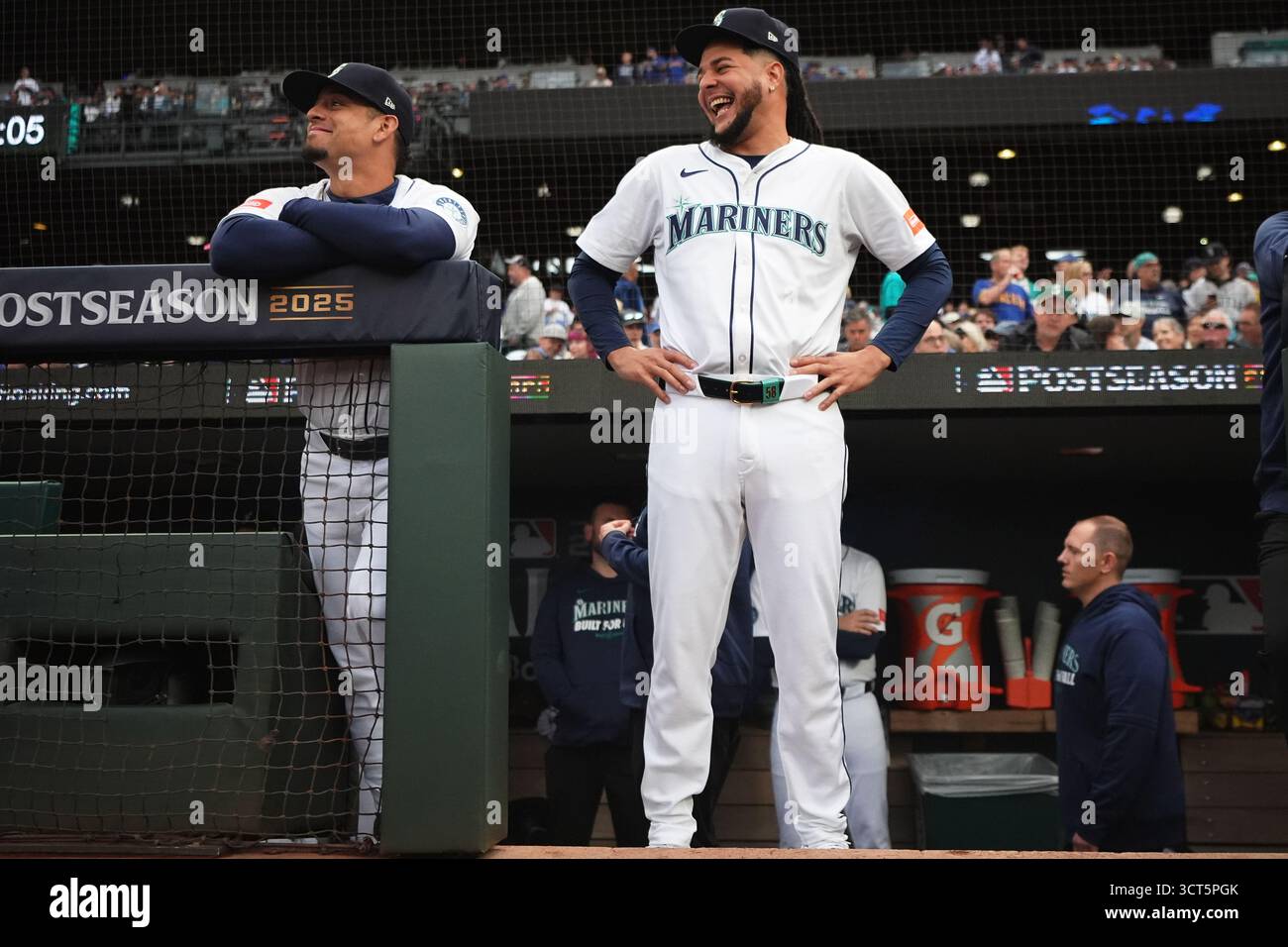 Seattle Mariners second baseman Leo Rivas, left, and starting pitcher ...