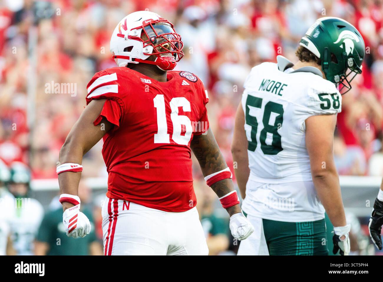 Nebraska defensive lineman Elijah Jeudy (16) celebrates after a play ...