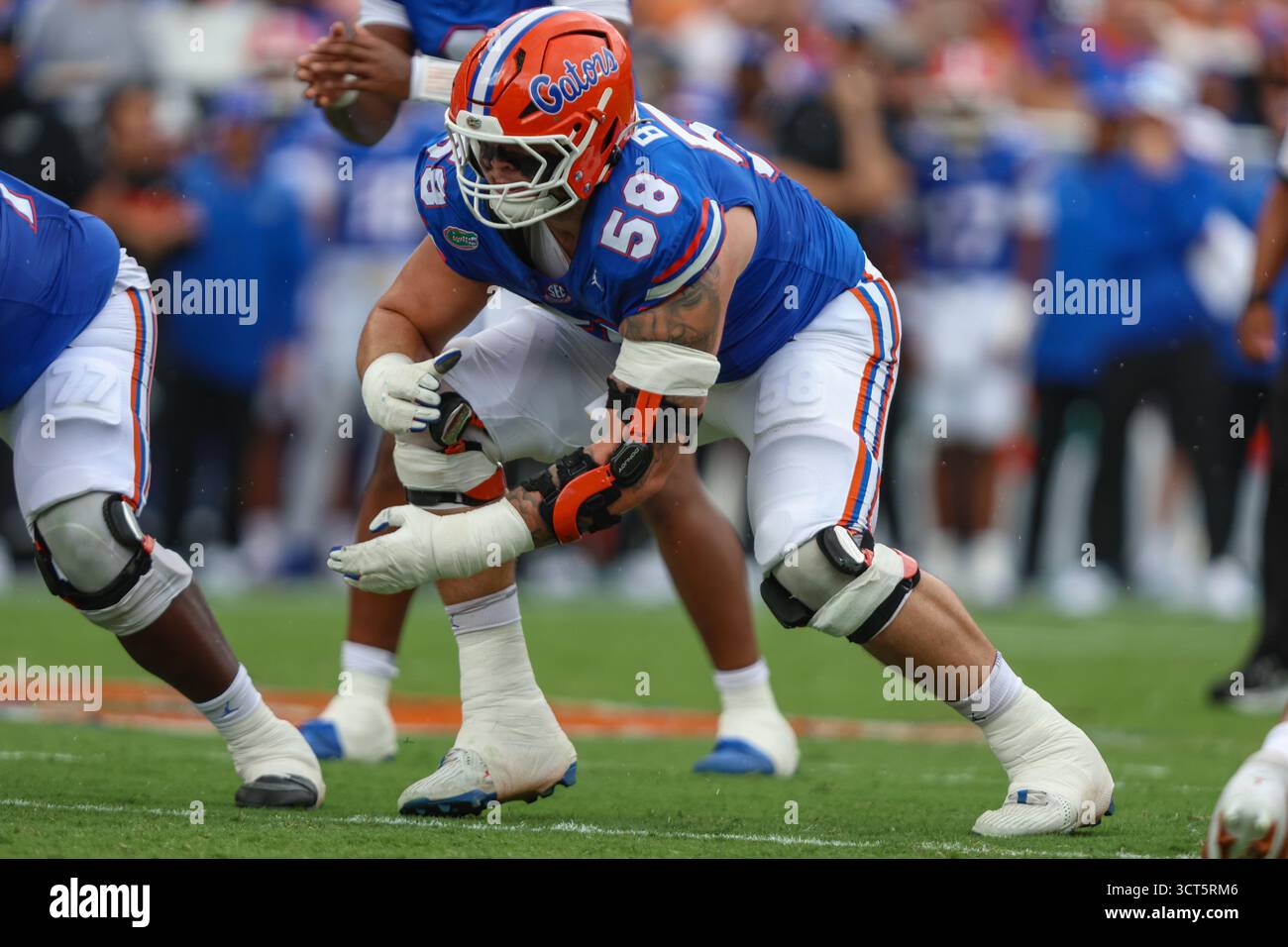 Florida offensive lineman Austin Barber (58) fires off the line at the ...