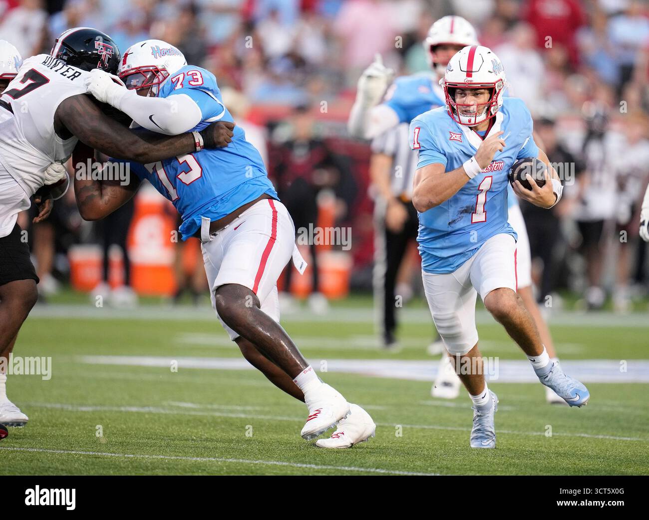 Houston quarterback Conner Weigman (1) runs the ball against Texas Tech ...