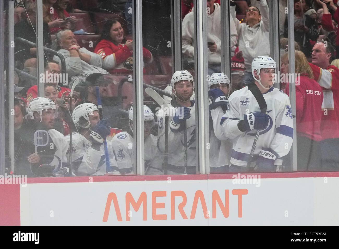 Tampa Bay Lightning players look from the penalty box during the second ...