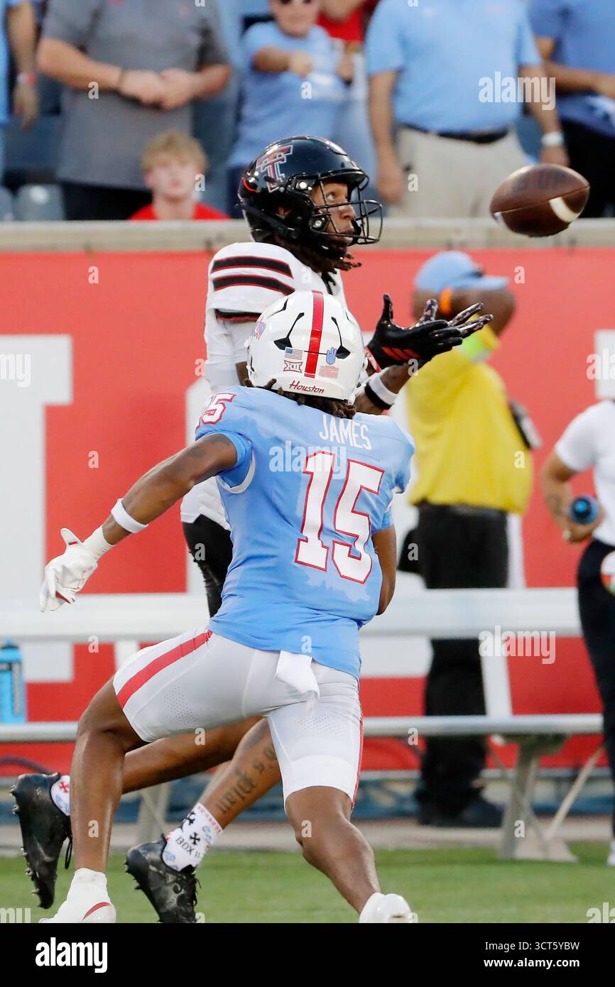 Texas Tech wide receiver Caleb Douglas, top, makes the reception over ...