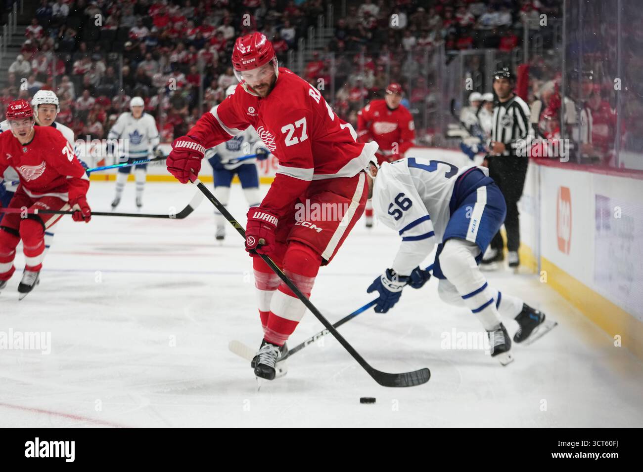 Detroit Red Wings center Michael Rasmussen (27) collects the puck from ...
