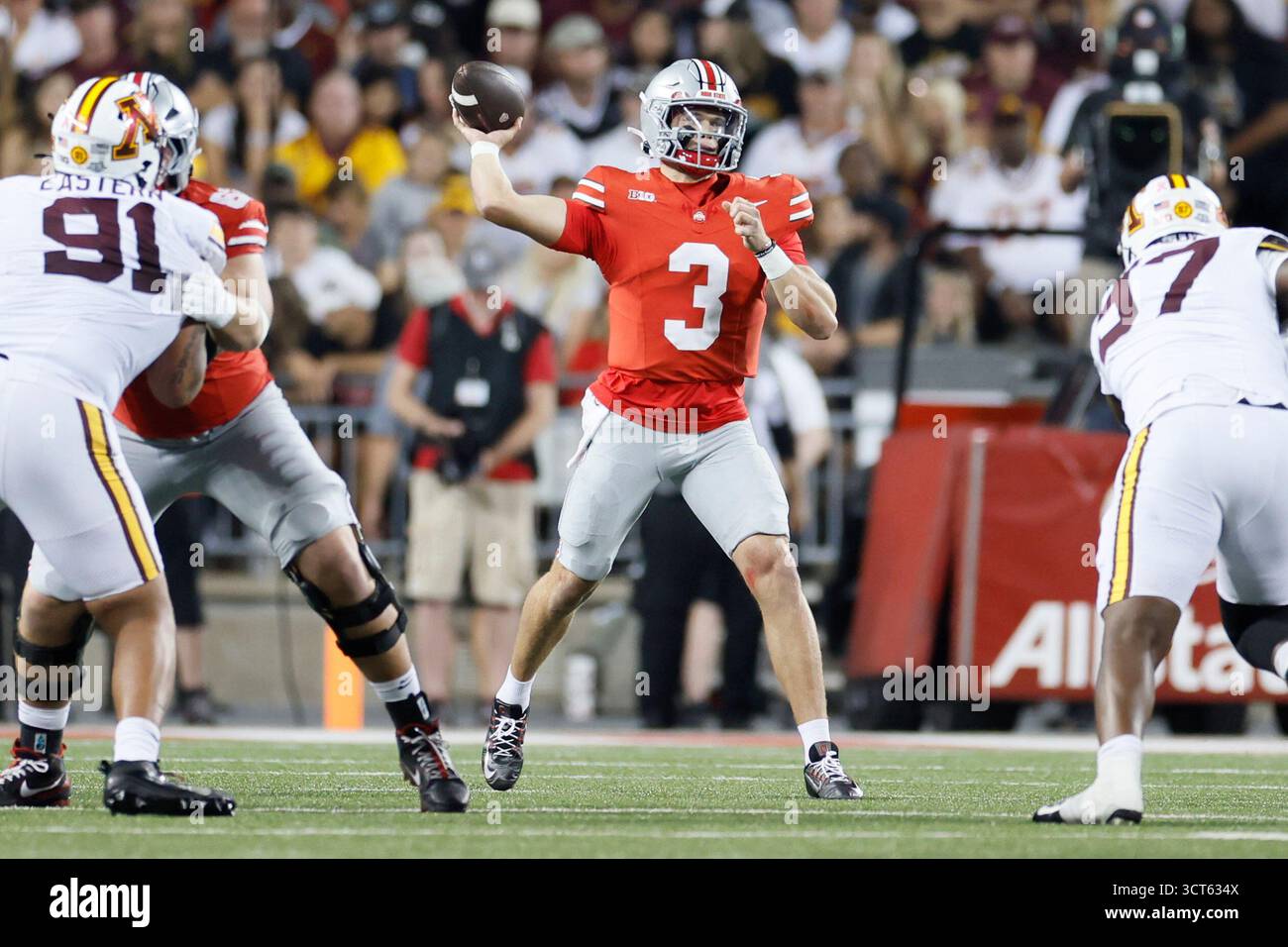 Ohio State quarterback Lincoln Kienholz throws a pass against Minnesota ...