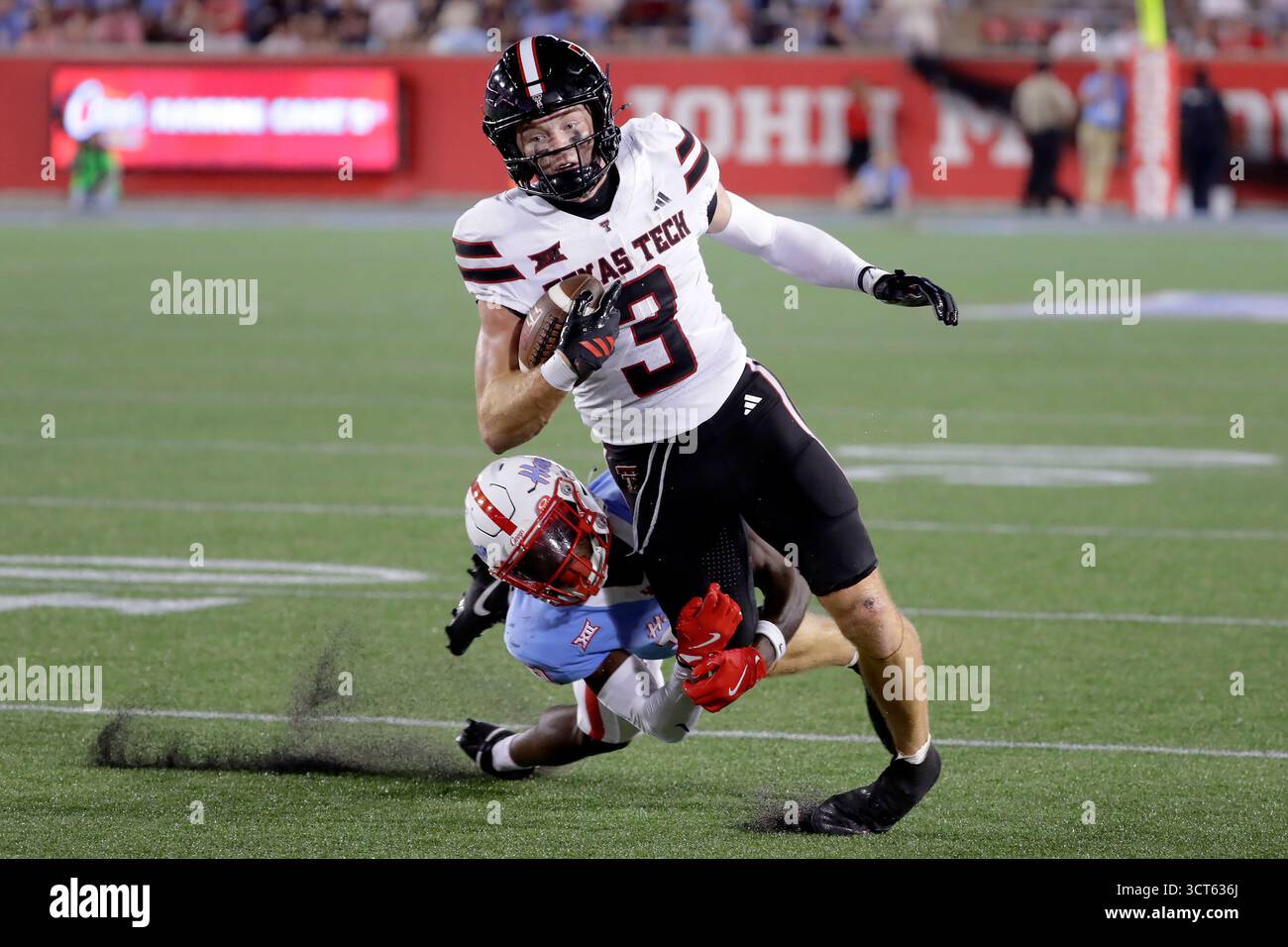 Texas Tech wide receiver Coy Eakin (3) is caught by Houston defensive ...