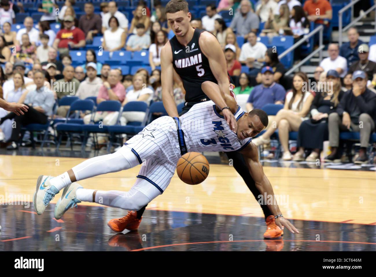 Orlando Magic guard Desmond Bane (3) dives for the ball in front of ...
