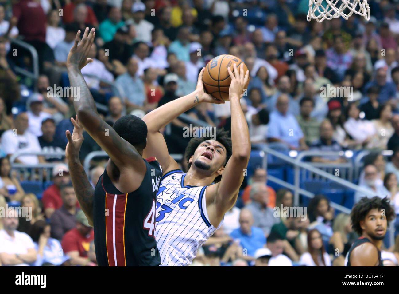 Orlando Magic forward Noah Penda, second from left, looks to shoot ...