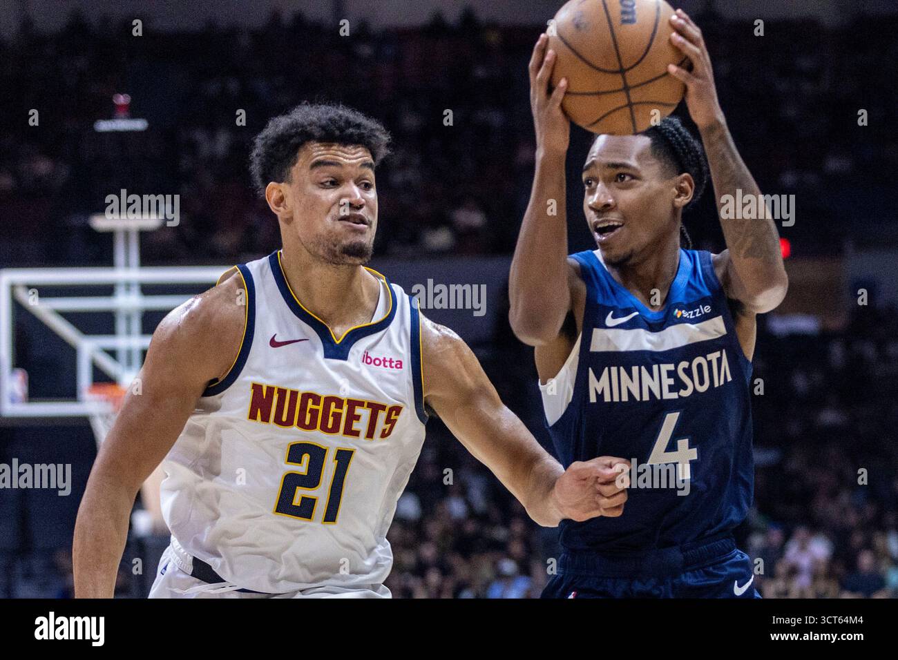 Denver Nuggets forward Spencer Jones (21) defends against Minnesota ...