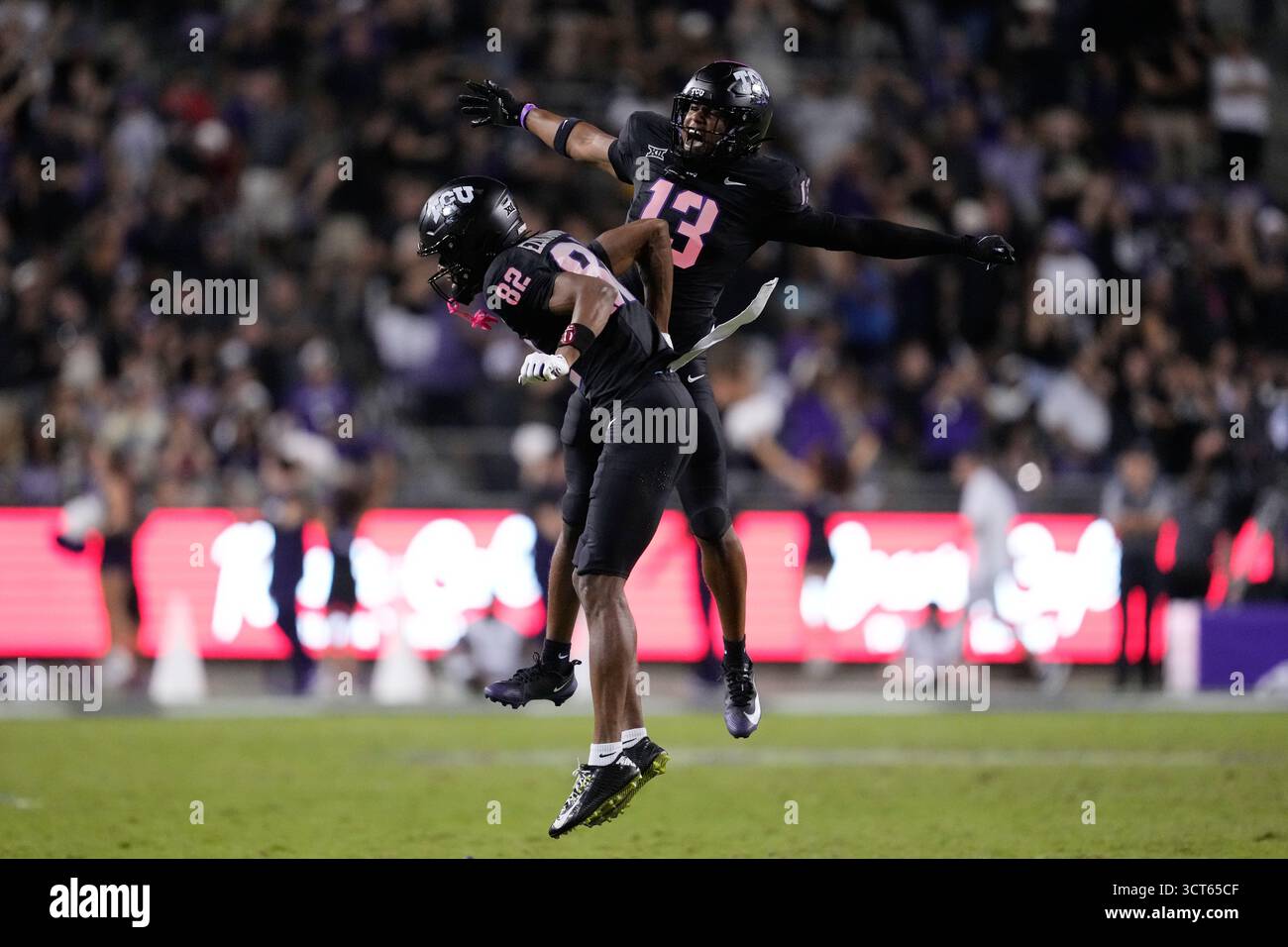 TCU wide receiver Dozie Ezukanma (82) and safety Ryan Yaites (13 ...