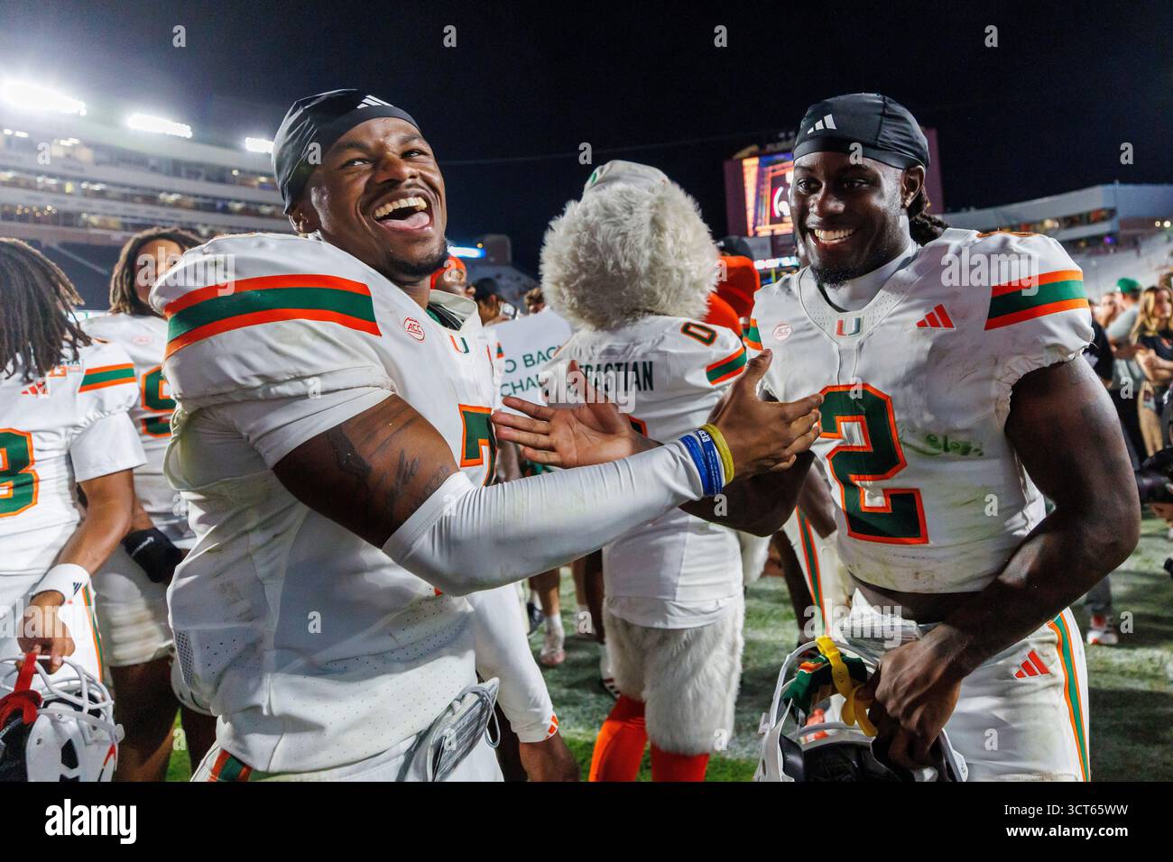Miami defensive backs Zechariah Poyser (7) and Damari Brown (2 ...