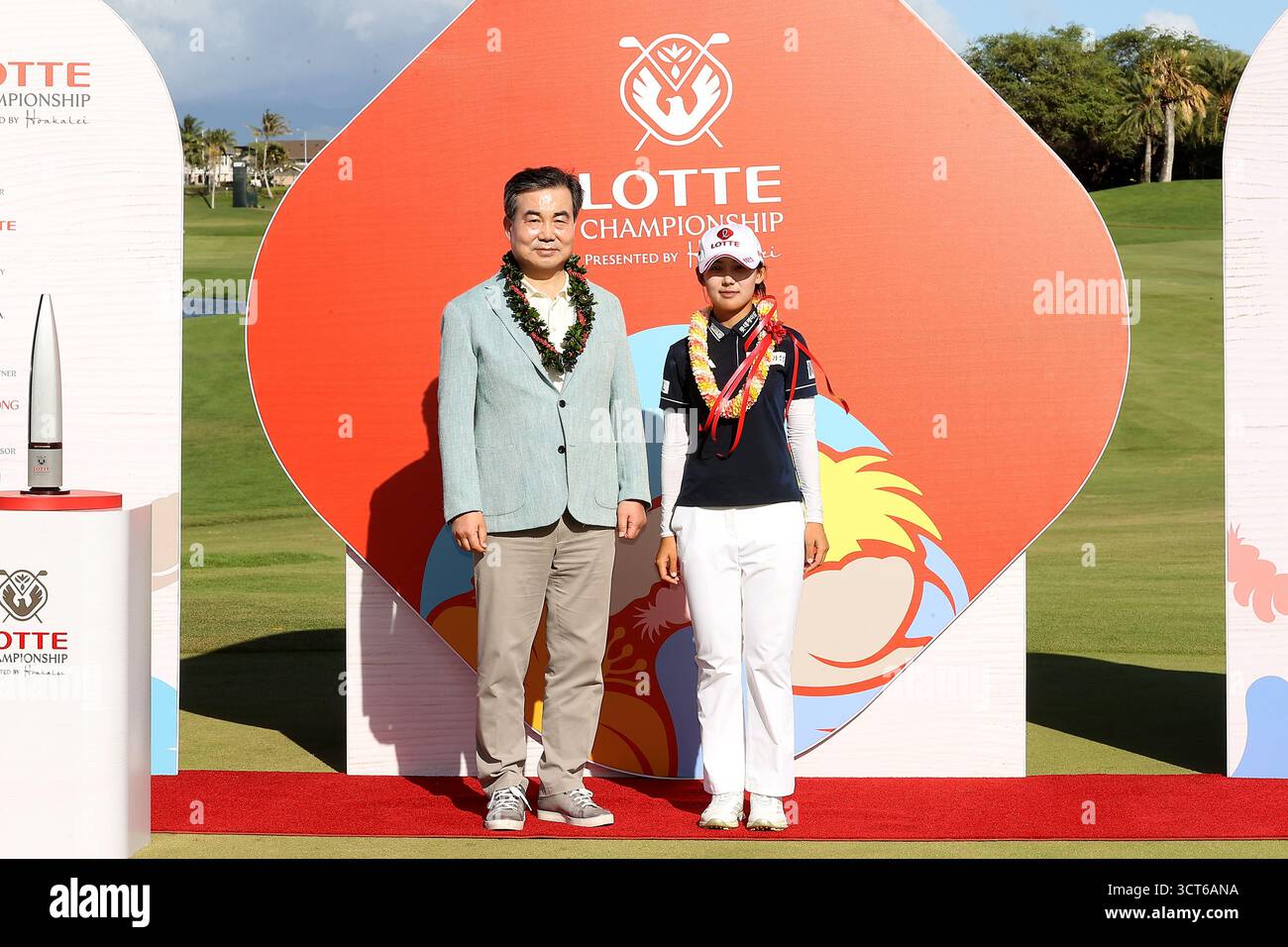 October 4, 2025 - Youmin Hwang poses with Lotte Chairperson Shin Dong ...