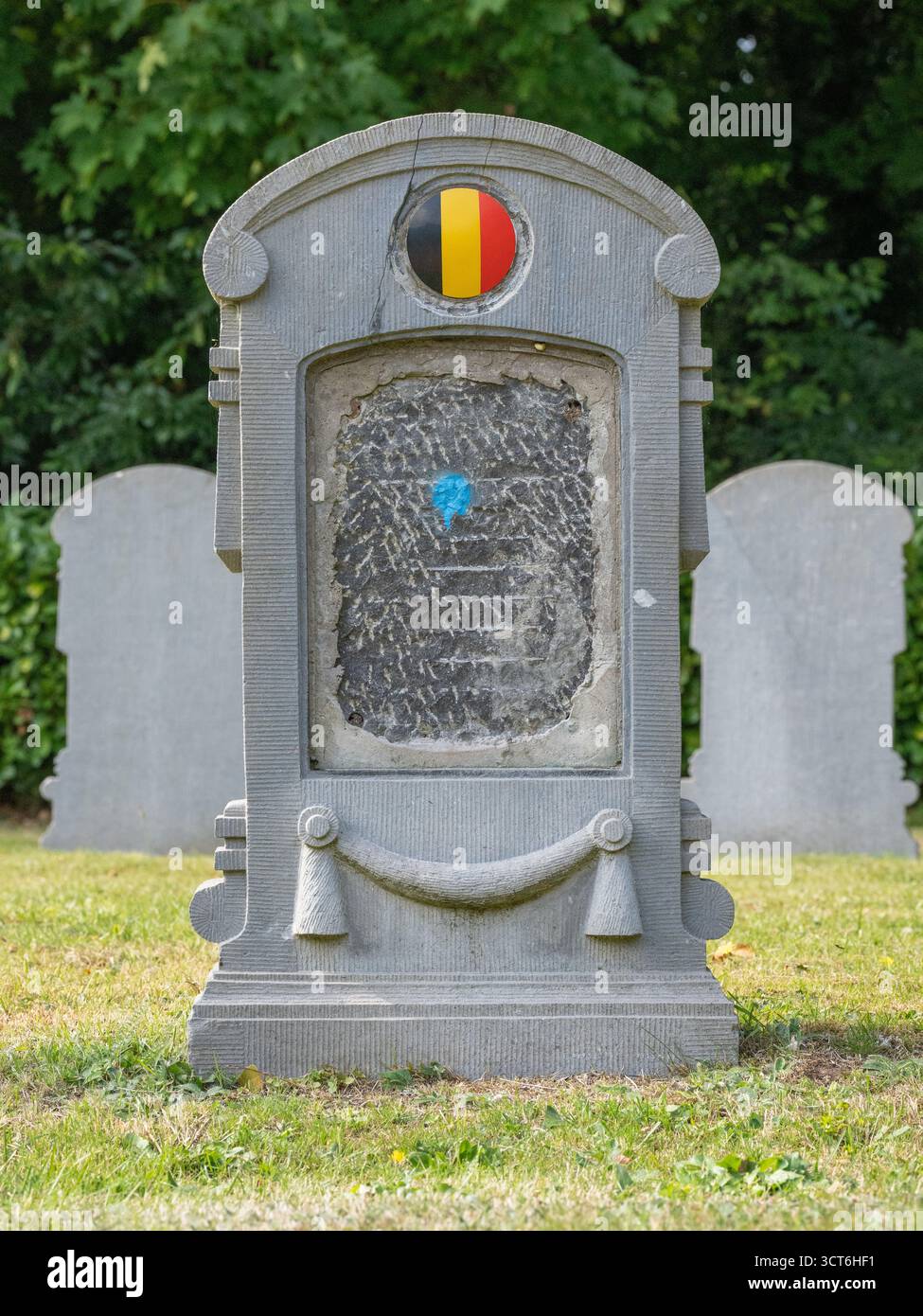 Damaged tombstone at the Belgian Military Cemetery in Leopoldsburg ...