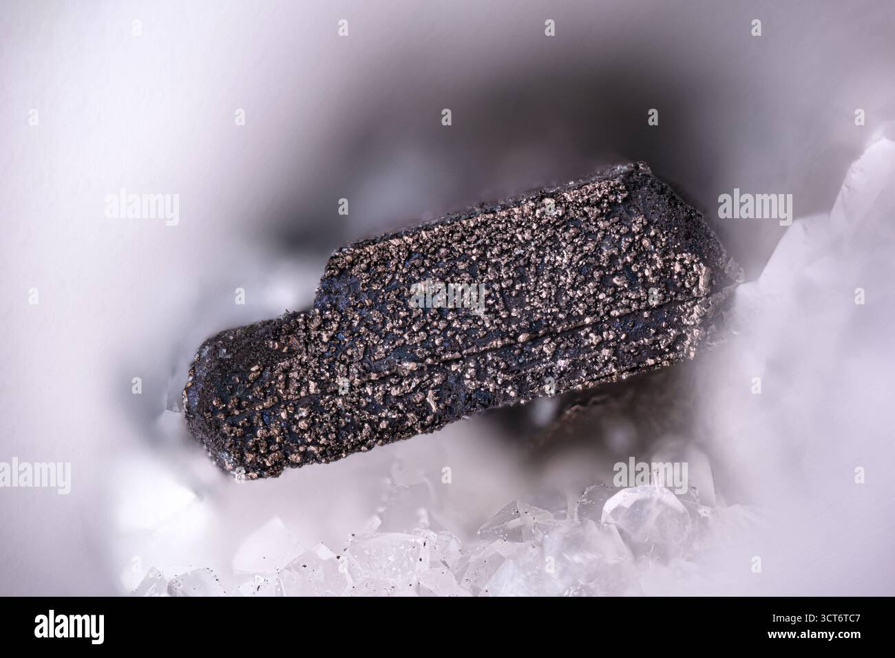 Small brown copper-colored Famatinite on Chalcopyrite. Specimen from ...