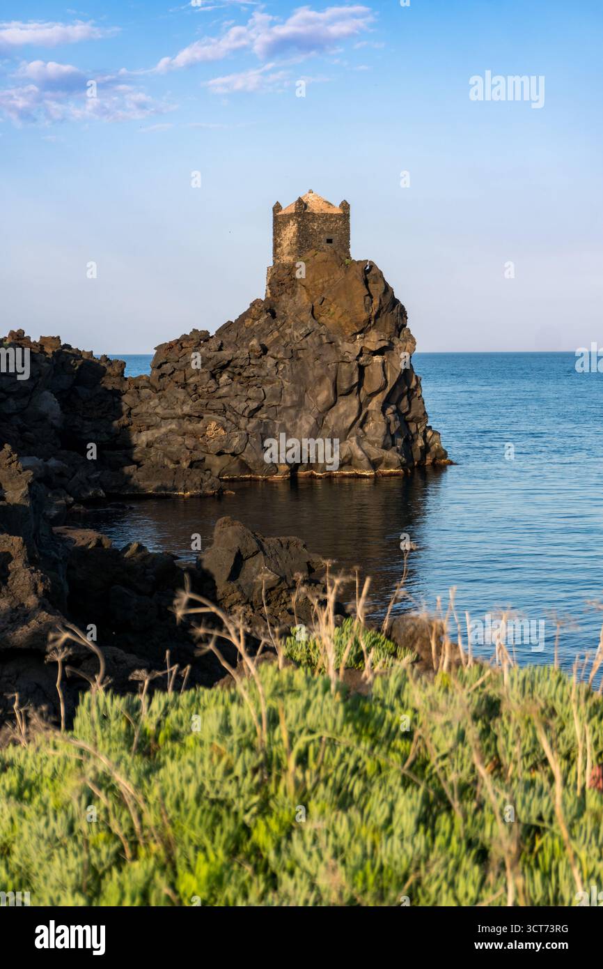 vertical photograph of the ancient tower of Santa Tecla used as an ...