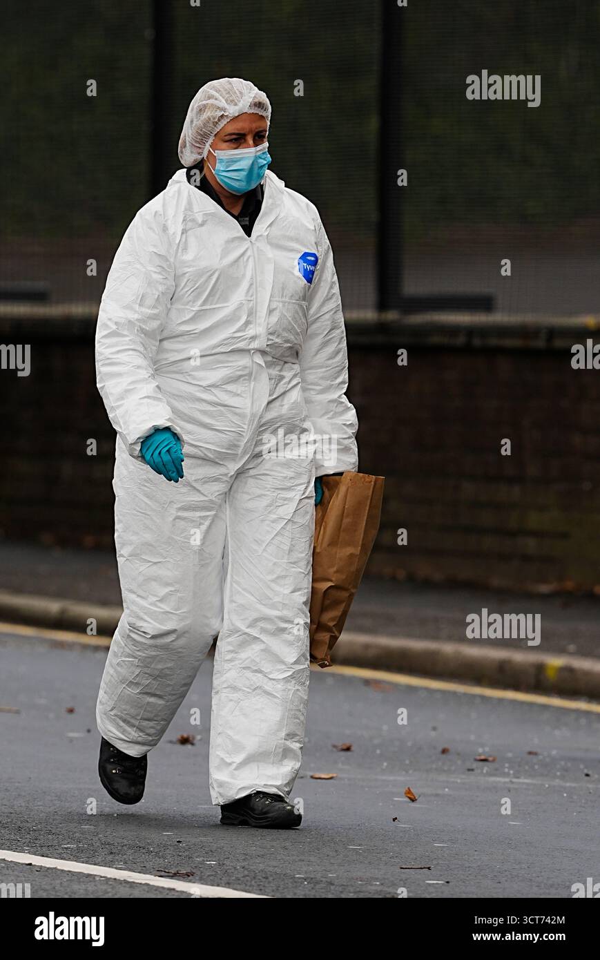A police forensics officer works at the scene at Heaton Park Hebrew ...