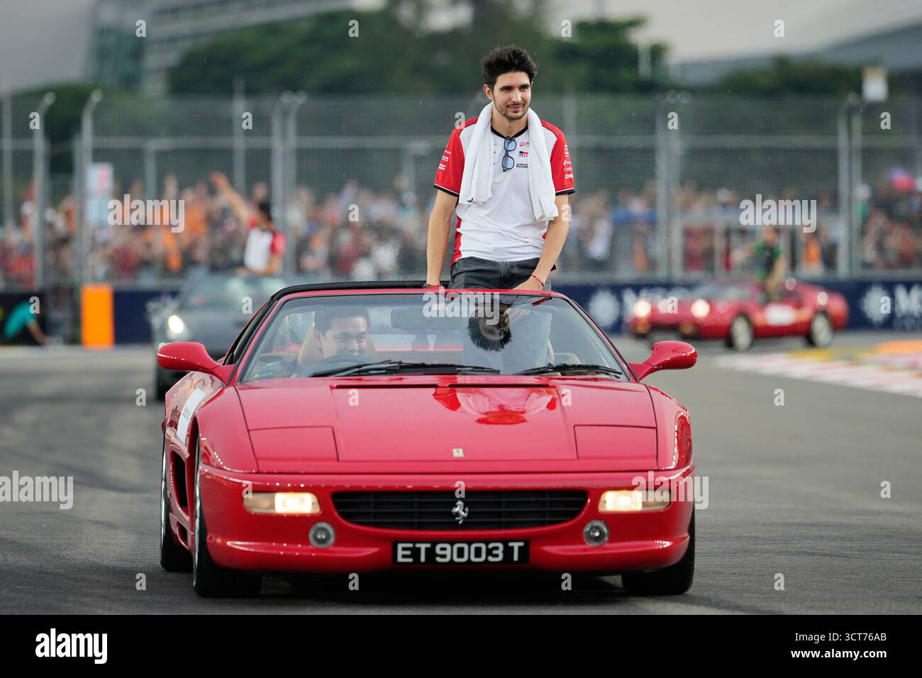 Haas driver Esteban Ocon of France takes part in the drivers' parade at ...