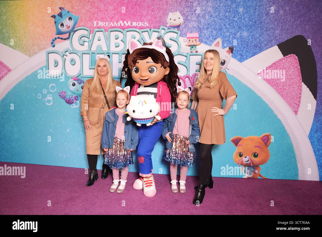Casey Major-Bunce and children attend Gabby's Dollshouse The Movie UK ...