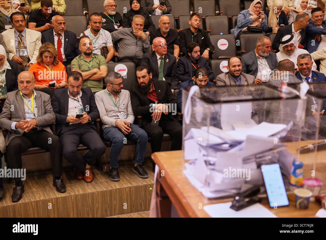 Observers watch the voting of electoral college members in ...