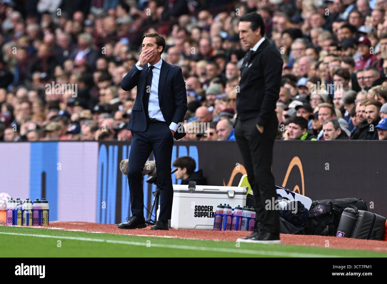 Burnley manager Scott Parker (left) and Aston Villa manager Unai Emery ...