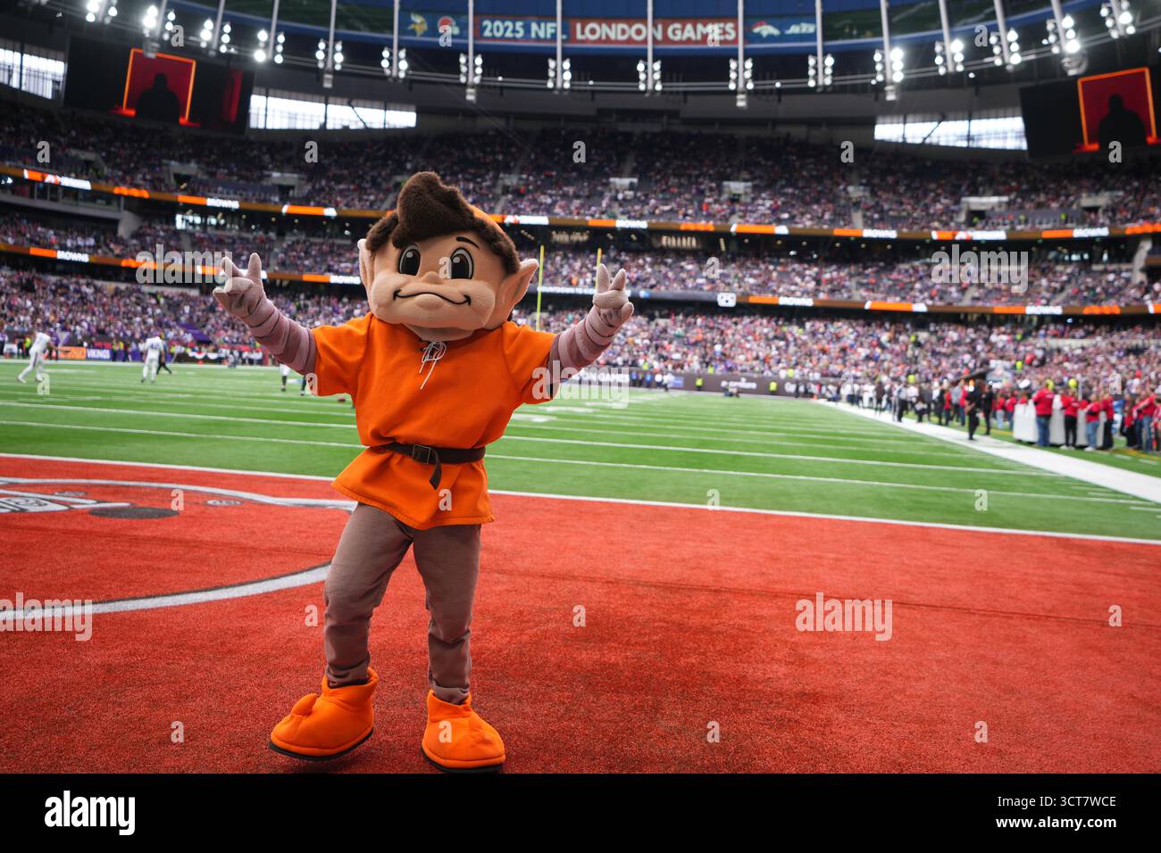 Cleveland Browns mascot Brownie the Elf stands on the field before NFL ...