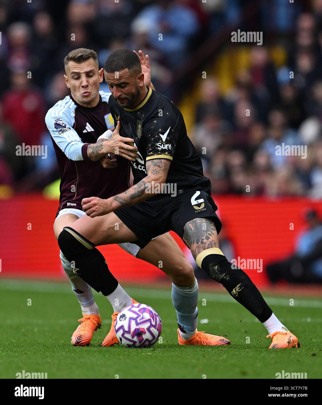 Aston Villa's Lucas Digne (left) and Burnley's Kyle Walker battle for ...