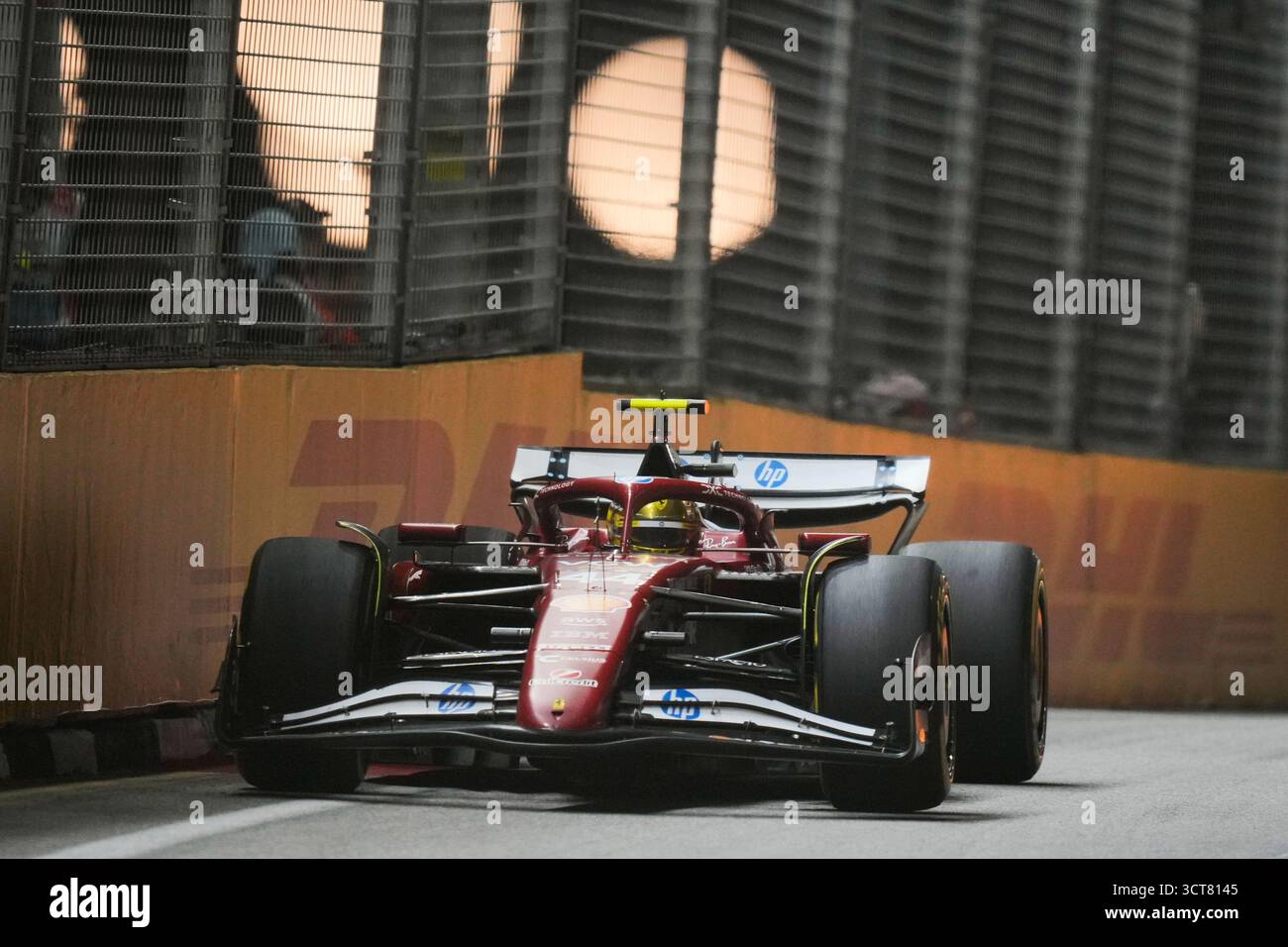 Ferrari driver Lewis Hamilton of Britain steers his car during the ...