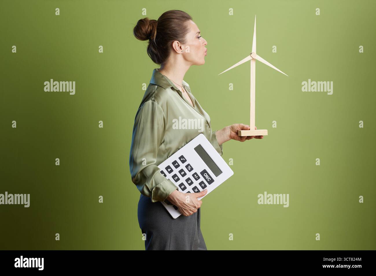 Woman wind turbine calculator hi-res stock photography and images - Alamy