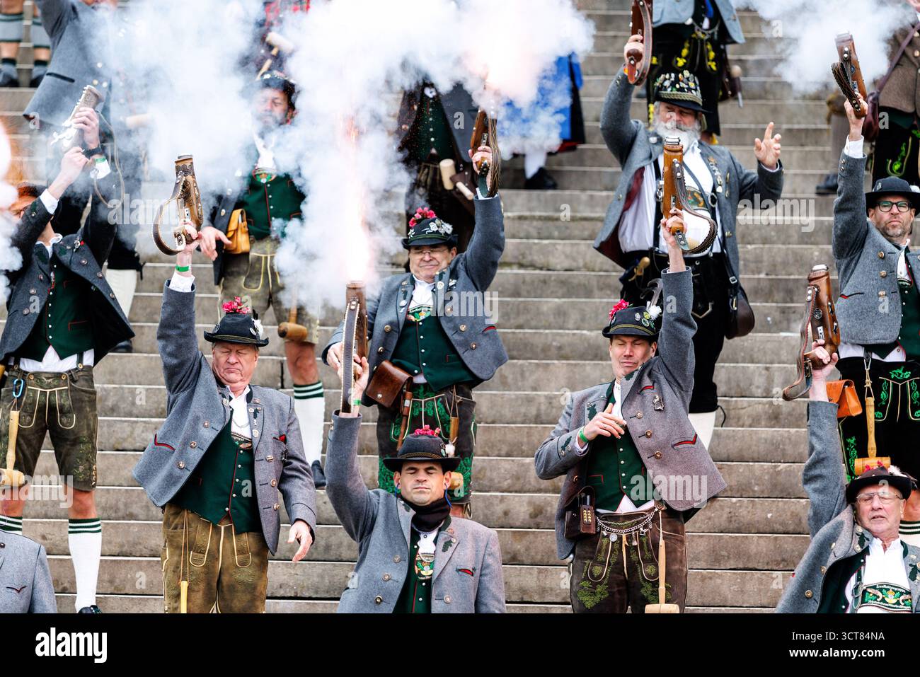 05 October 2025, Bavaria, Munich: Firecrackers shoot their guns into ...