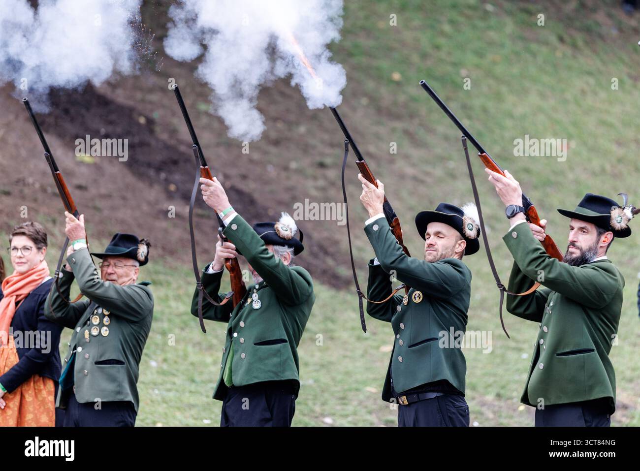 05 October 2025, Bavaria, Munich: Shooters fire their guns into the air ...