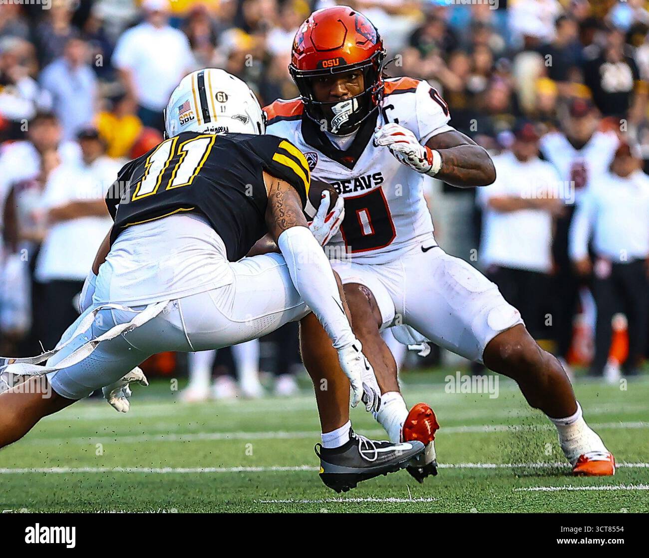 October 4, 2025: App State defensive back Juan Berchal (11) hits Oregon ...