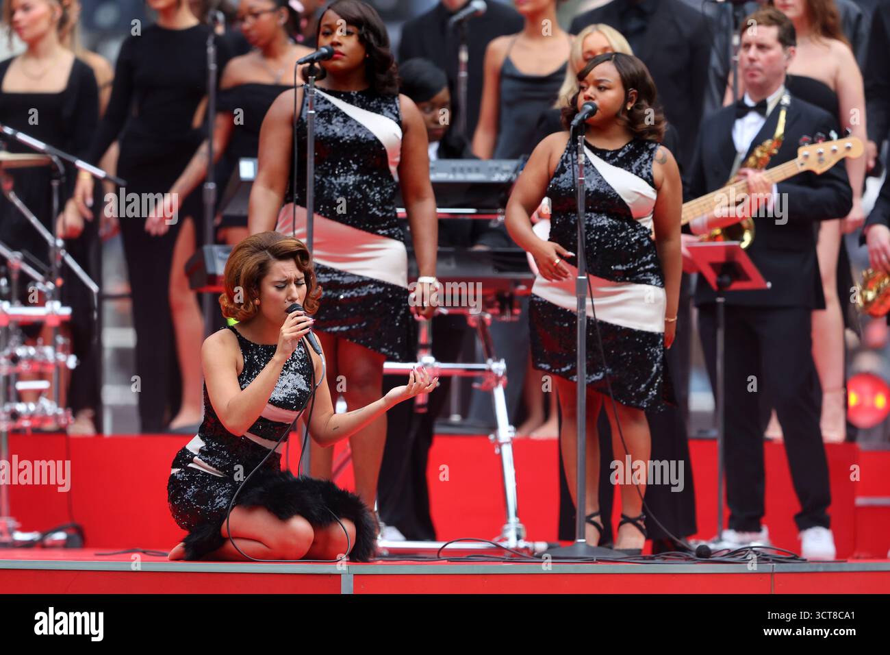 Raye performs at halftime during an NFL football game between the ...