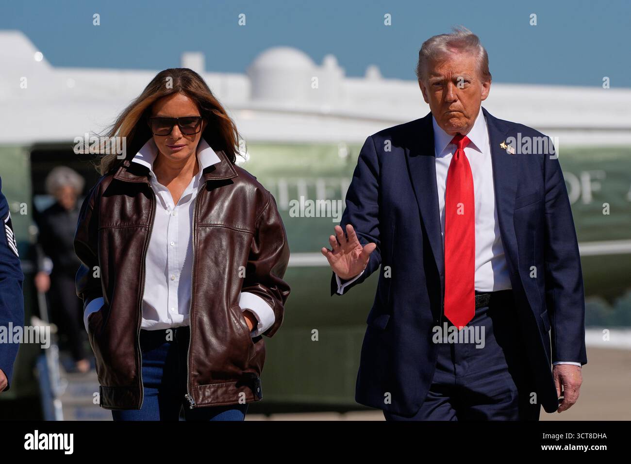 President Donald Trump and first lady Melania Trump walk from Marine ...