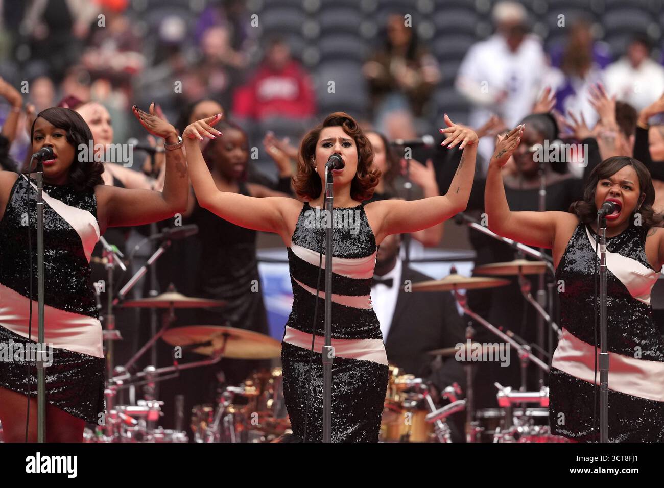 Raye performs during halftime at an NFL football game between the ...