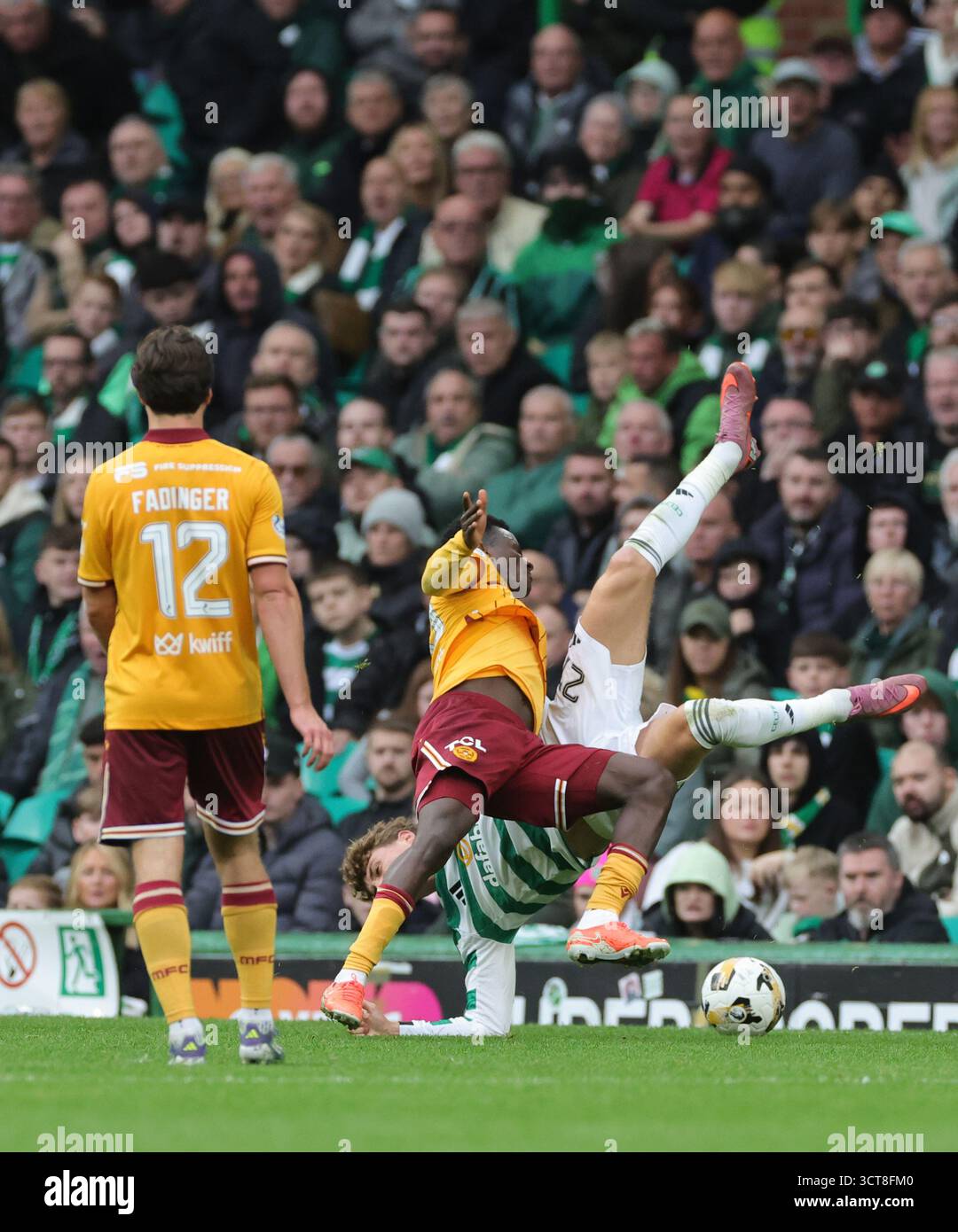 Celtic's Arne Engels and Motherwell's Ibrahim Said battle for the ball ...