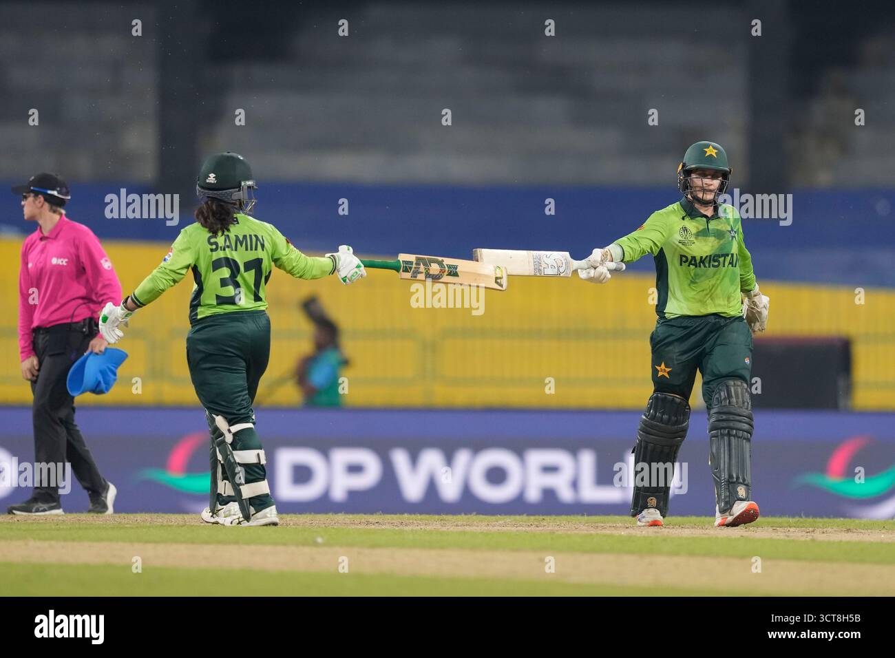 Pakistan's Natalia Parvaiz and Sidra Amin cheer each others during the ...