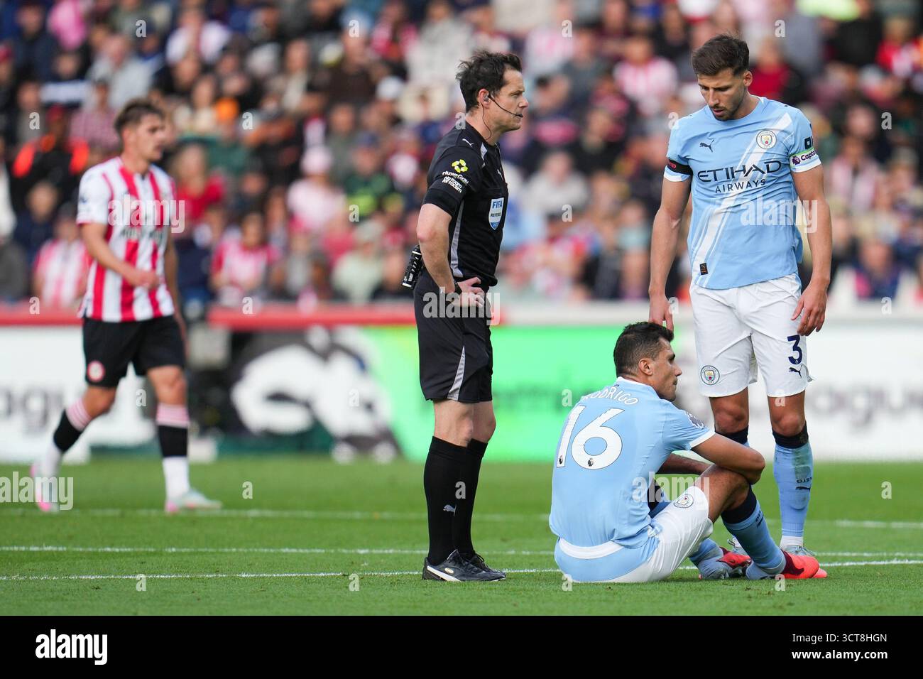 Rodri of Manchester City goes down injured during the Premier League ...